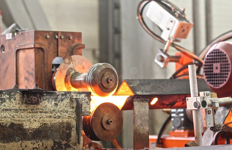 Moving the Heated Metal Rod Stock Photo - Image of rollers, manufacture ...