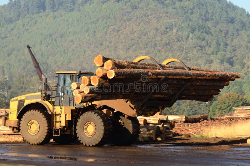 Moving Logs stock photo. Image of claw, mover, equipment - 21965644