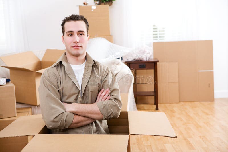 Moving: Man Sits Inside Empty Packing Box Stock Photo - Image of ...