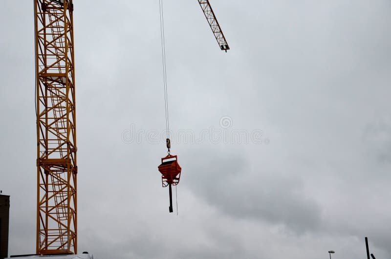 Moving Material To the Construction Site. the Crane Carries Stock Photo ...