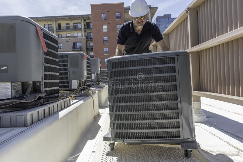 Moving a New Air Conditioner for an Install Stock Image - Image of ...