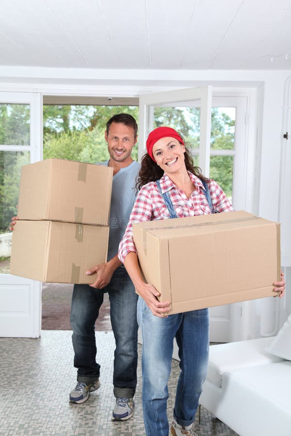 Couple Moving into New Home Stock Photo - Image of moving, outside ...