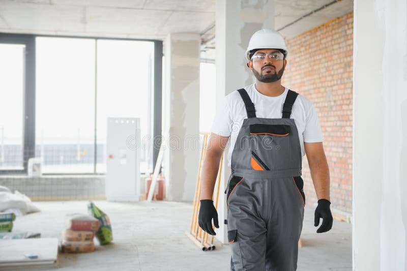 Moving, Repair and People Concept. Happy Smiling Indian Worker Stock ...