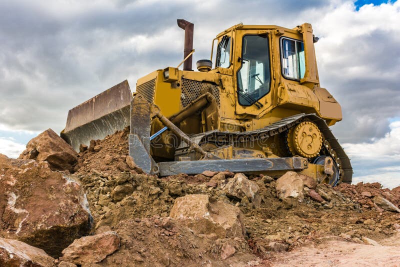 Moving Rock and Sand in a Construction Site Stock Photo - Image of ...