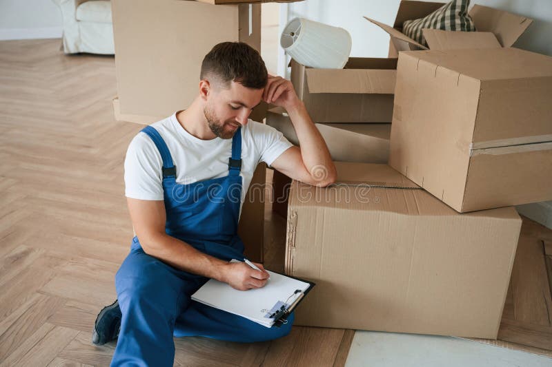 Moving Service Employee in a Room Stock Image - Image of person ...
