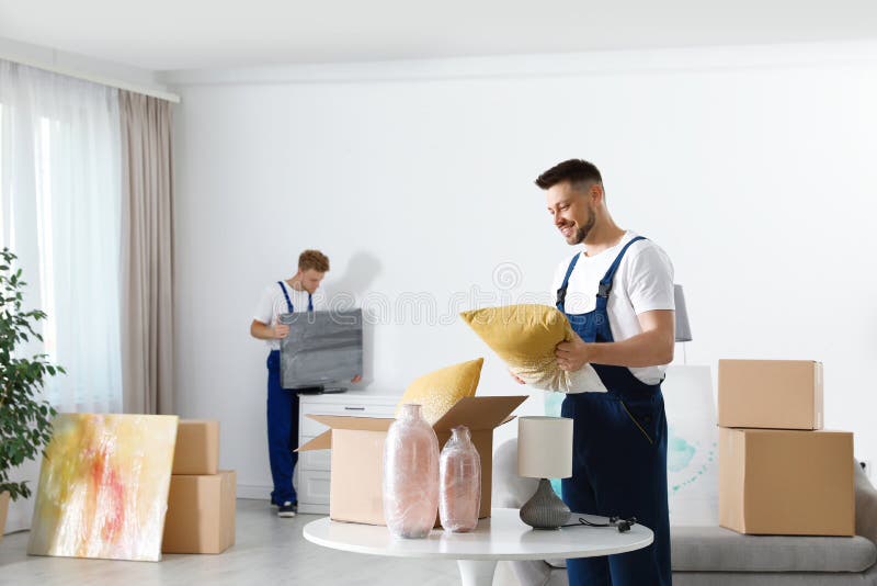 Moving Service Employees Packaging Belongings Stock Image - Image of ...
