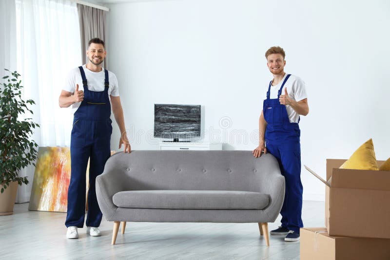 Moving Service Employees with Sofa Stock Photo - Image of male ...