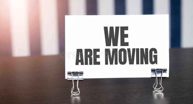 We are Moving Sign on a Pink Background Stock Image - Image of font ...