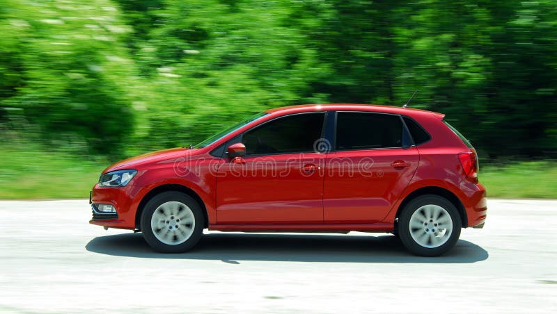 Moving small red car stock image. Image of business, drive - 53442401
