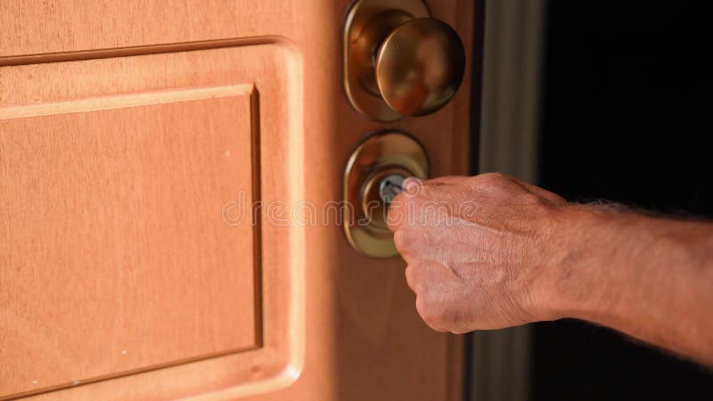 Moving To a New House Concept. Inserting Key into a New Lock Stock ...