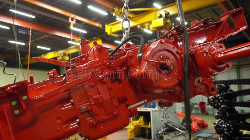 The Tractor Cab is Suspended in the Workshop on a Crane Beam, the ...