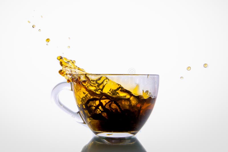 Moving a Transparent Cup of Tea on a White Background. Stock Image ...