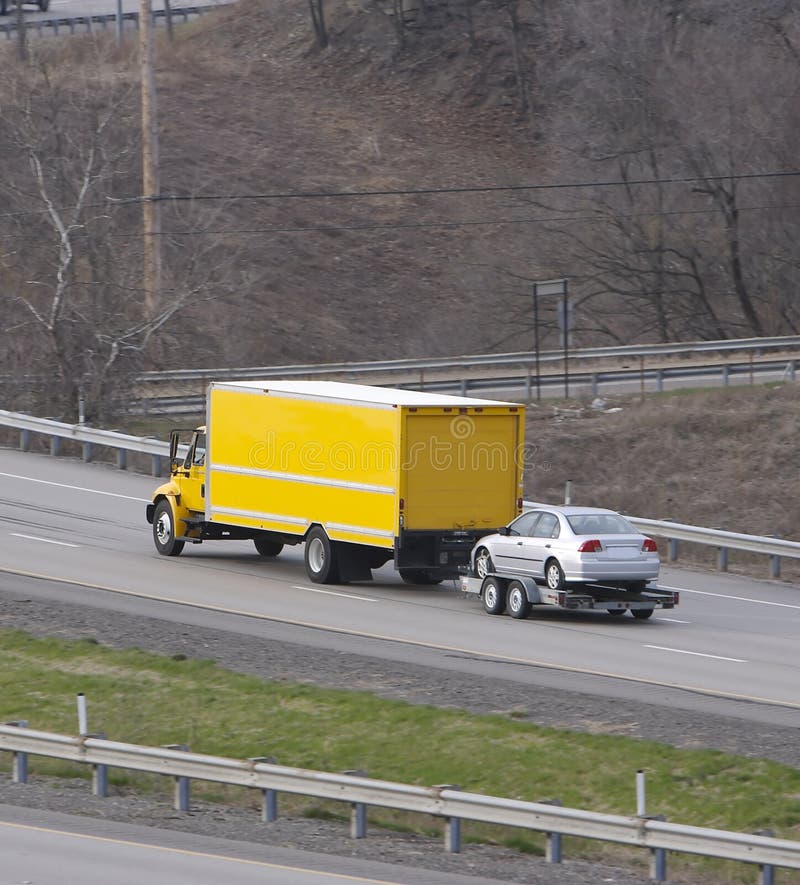 Moving Van & Car stock photo. Image of haul, auto, blur - 656238