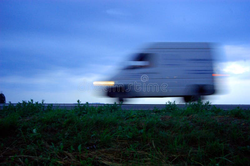 A Moving Van on the Highway at Twilight Stock Photo - Image of ...