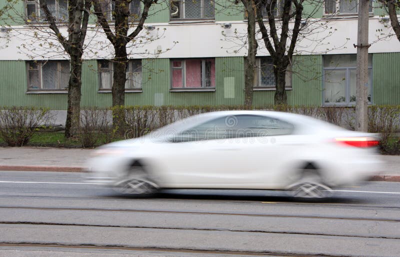 Moving White Car with Motion Blur Effect Stock Image - Image of street ...