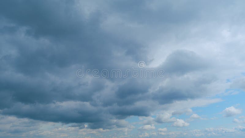 Moving White Cloud. Dramatic Sky. Rain Cloudscape Formation in the Blue Sky. Time Lapse. Stock ...
