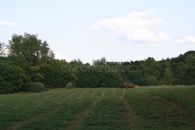 Mowing Hay stock image. Image of deere, mowed, field - 47597579