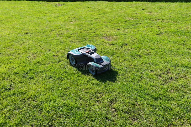 Mowing Robot, Automatic Lawn Mower Stock Image - Image of machine ...