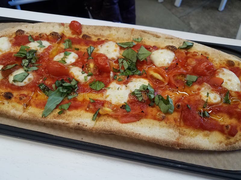 Mozzarella Cheese and Basil Pizza with Tomato Stock Photo - Image of ...