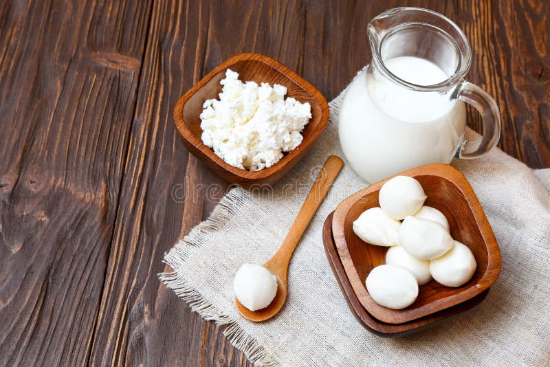 Mozzarella Cheese in a Wooden Bowl on the Table Stock Photo - Image of ...
