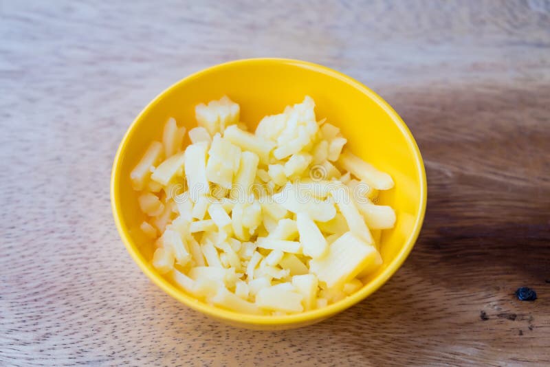 Mozzarella Cheese in Yellow Cups Stock Photo - Image of kitchen ...