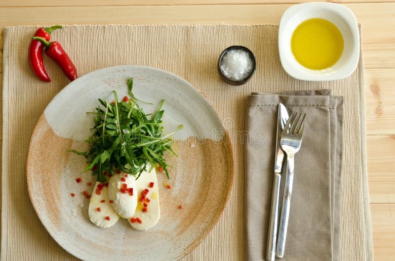 Mozzarella with Chilli and Rocket Stock Photo - Image of olive, starter ...