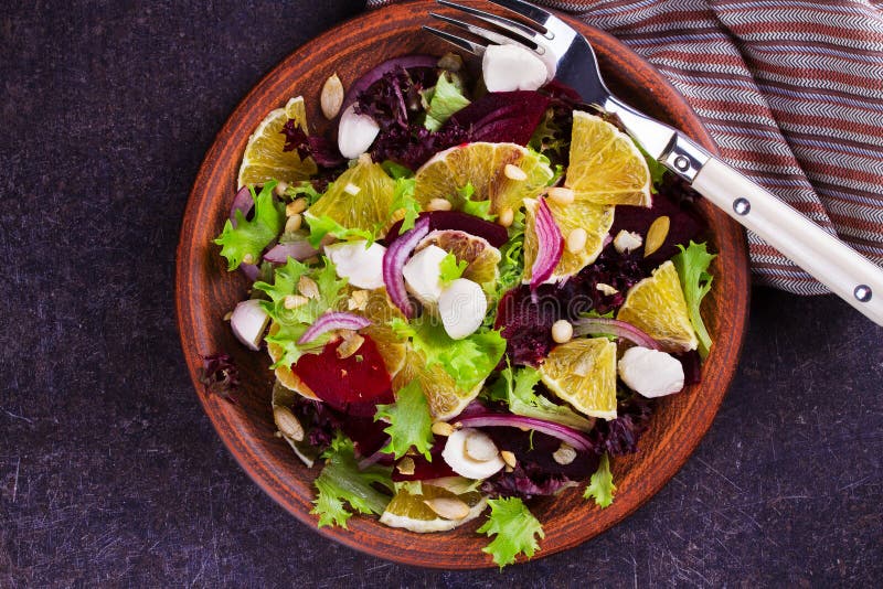 Mozzarella, Orange, Beetroot, Red Onion, Nuts and Seeds Salad. Stock ...