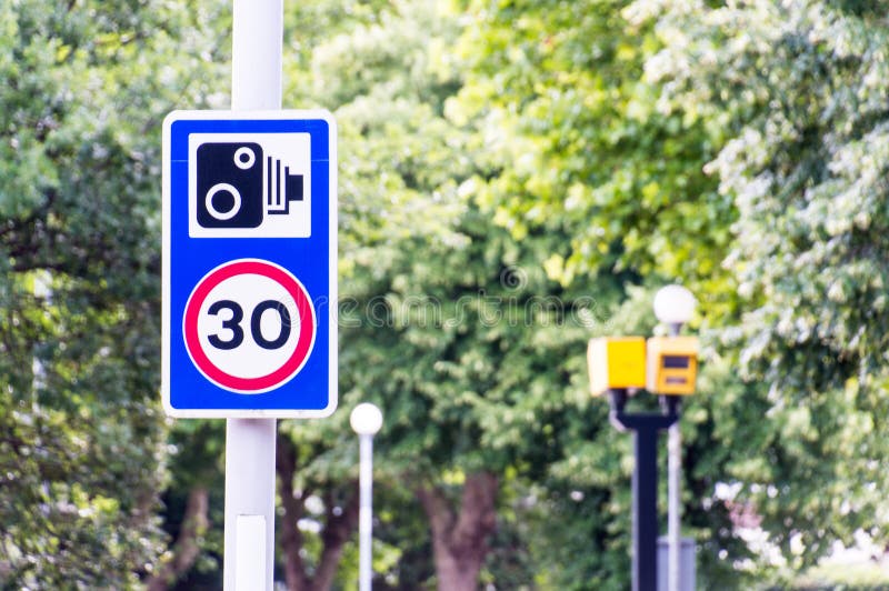 30mph Camera Speed Limit Notice with Yellow Camera in Background Stock ...