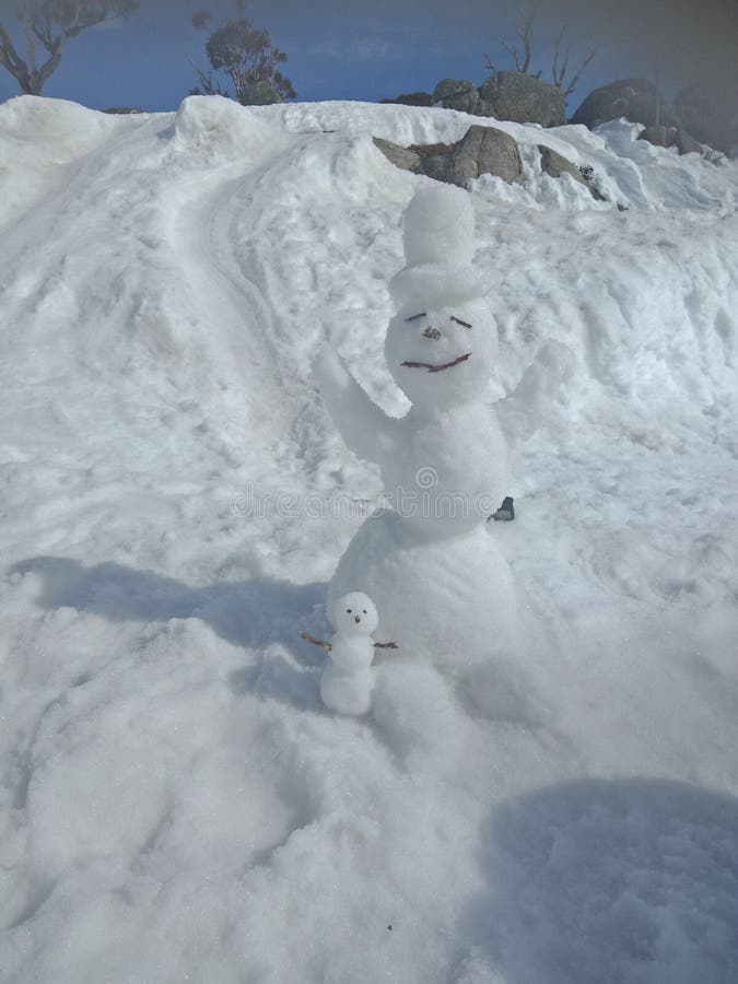 Mr snowman and his child stock image. Image of white - 182103903