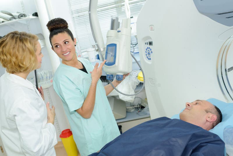 MRI Operator Explaning How System Work Stock Image - Image of physical ...