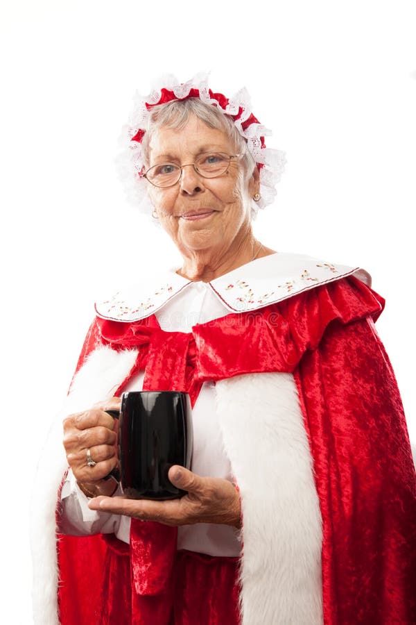 Mrs. Clause holding a cup stock image. Image of composition - 30047593