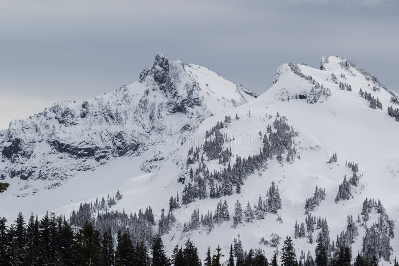 Mt Rainier Low Snow Fall on Near by Peaks Stock Photo - Image of blue ...