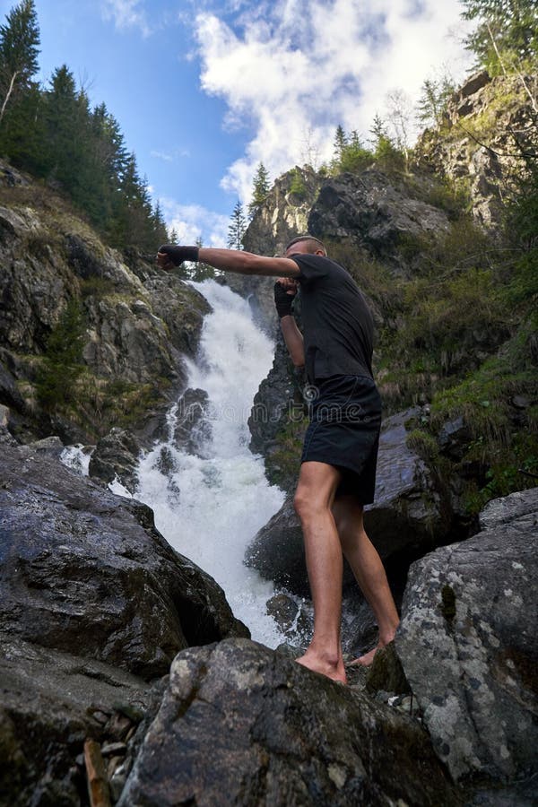 Muay Thai Fighter Training by the Waterfall Stock Image - Image of kick ...