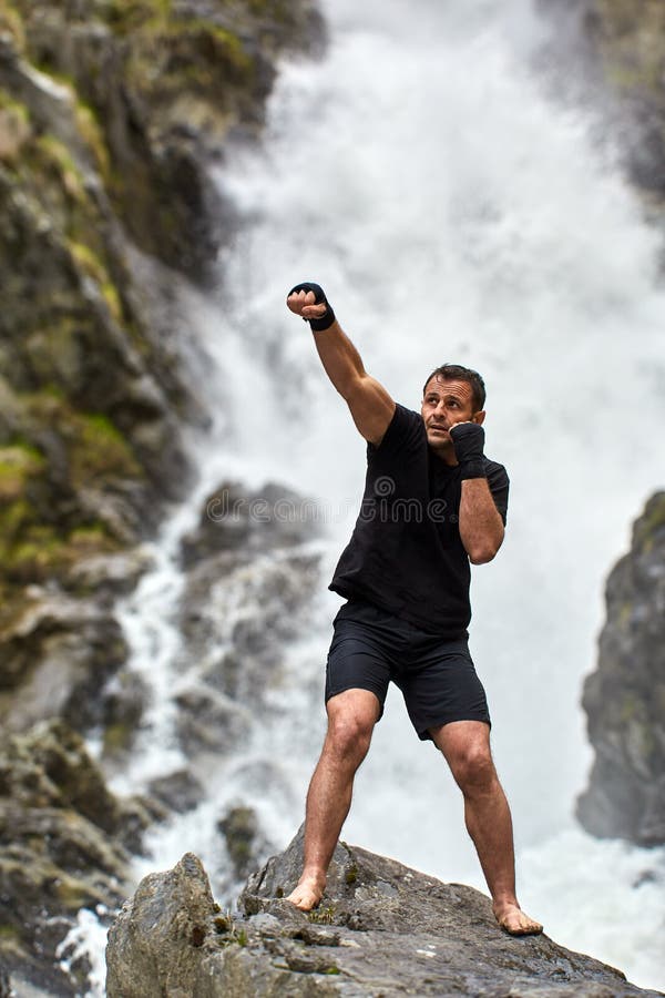Muay Thai Fighter Training by the Waterfall Stock Photo - Image of ...