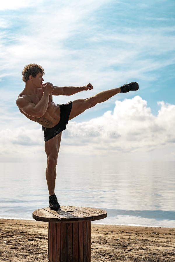 A Muay Thai or Kickboxer Training with Shadow Boxing Outdoor Stock ...