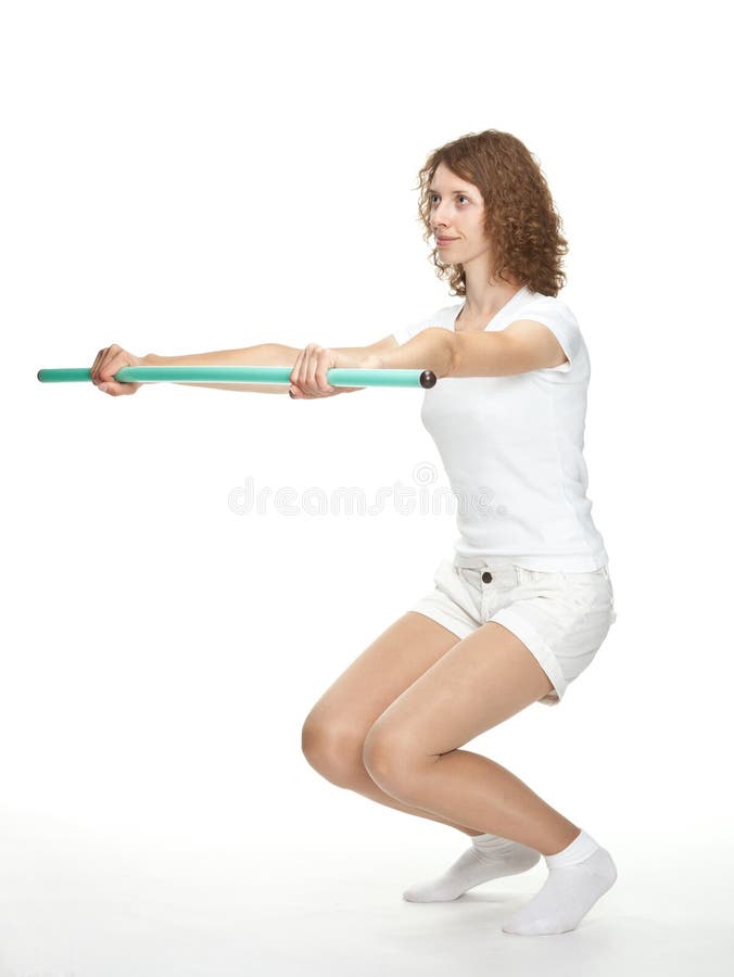 Muchacha Sonriente Que Se Pone En Cuclillas Imagen de archivo - Imagen ...