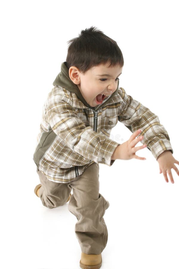 Muchacho feliz adorable foto de archivo. Imagen de cabrito - 1750914