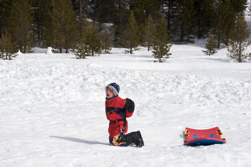 Muchacho Lastimado Sledding Imagen de archivo - Imagen de dolor, trineo ...