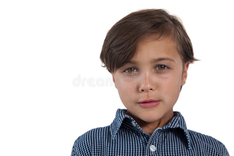 Muchacho Lindo Que Se Opone Al Fondo Blanco Imagen de archivo - Imagen ...