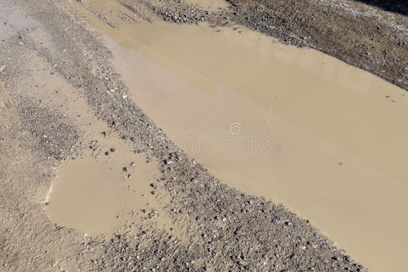 Mud and Dirty Water Puddle Formed As a Result of Rain Stock Image ...