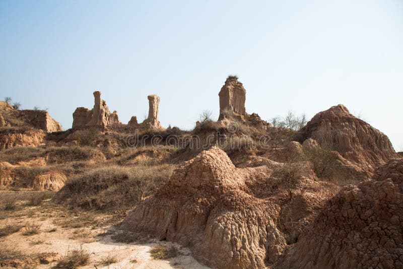 Mud dunes on erroded land stock photo. Image of cliff - 174589098