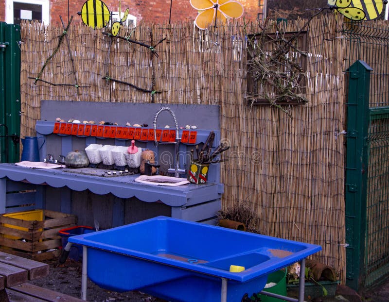 Outdoor Mud Kitchen with Blue Sandpit Stock Image - Image of sandpit ...