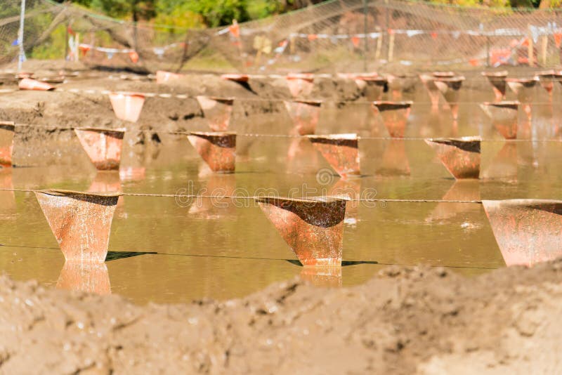 Mud Pit at a Mud Run Obstacle Course Stock Image - Image of muddy ...