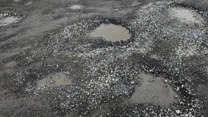 Mud Puddle and Pothole on the Road Surface Stock Image - Image of route ...