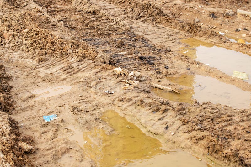 Mud and Puddle on a Sandy Road Stock Image - Image of trace, pattern ...