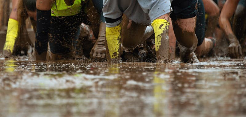 Mud race runners stock photo. Image of extreme, runner - 99993014