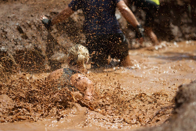 Mud race runners stock image. Image of outdoors, runner - 120611545
