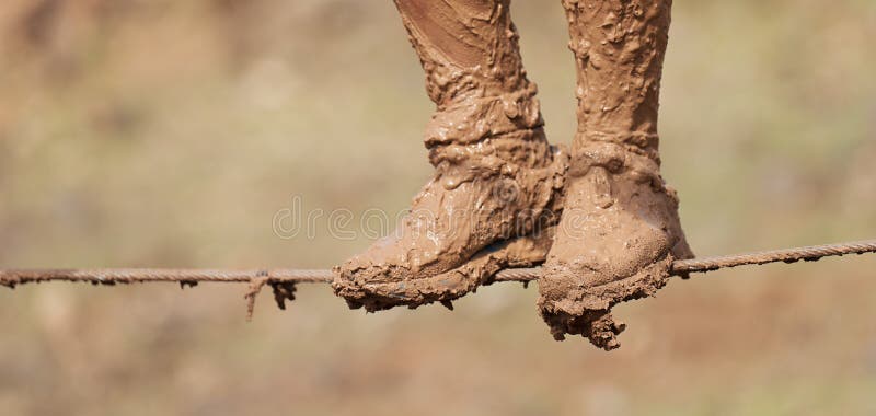 Mud race runner stock image. Image of dirty, rope, lifestyle - 259798909