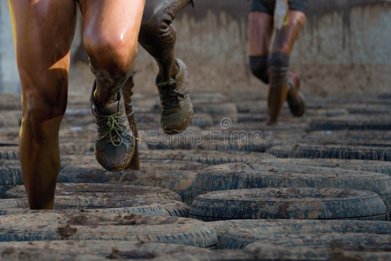 Mud race runners stock image. Image of outdoors, runners - 57021887