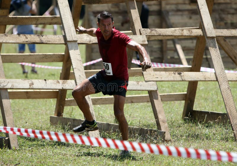 Mud running editorial image. Image of compete, competes - 55065285